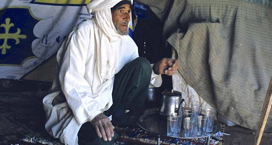 Berber Merchant In His Desert Tent - Joel Levinson